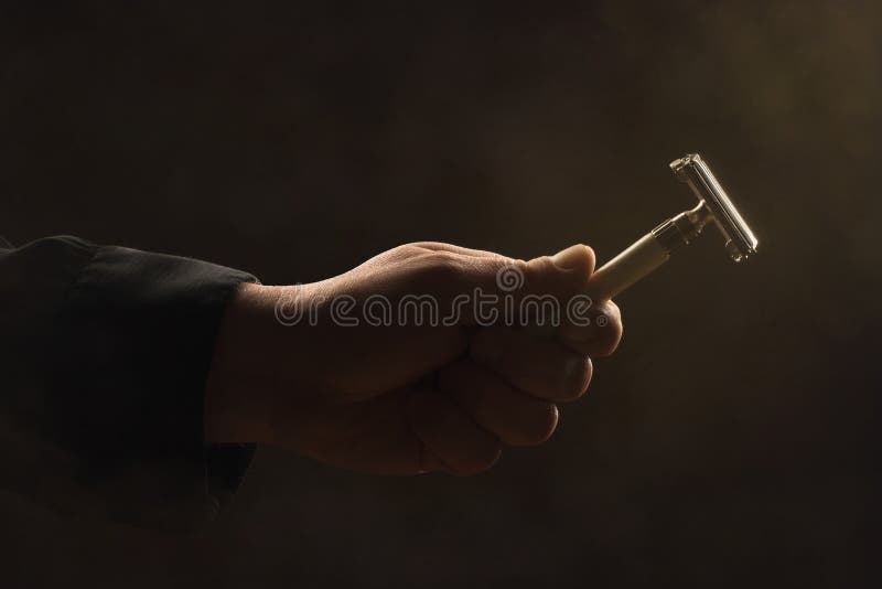 Male Hand Holding Safety Razor Stock Image - Image of hair, dark: 65719977