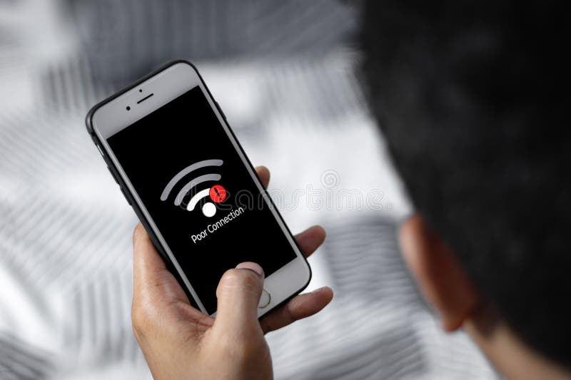Male Hand Holding Smartphone with Sign Bad Connection on Screen ...