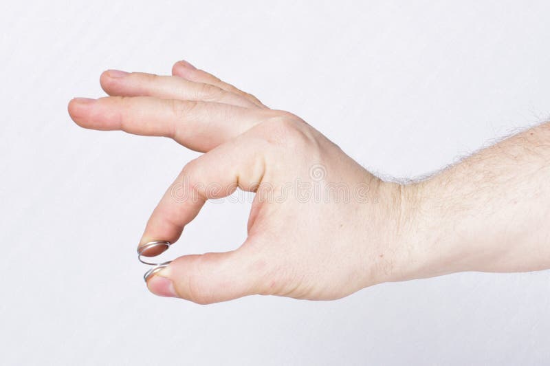 Male hand holding spring stock photo. Image of holding - 37504914