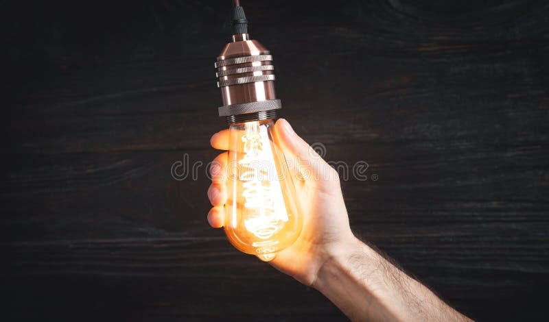 Male Hand Holding Vintage Modern Light Bulb Stock Image - Image of ...