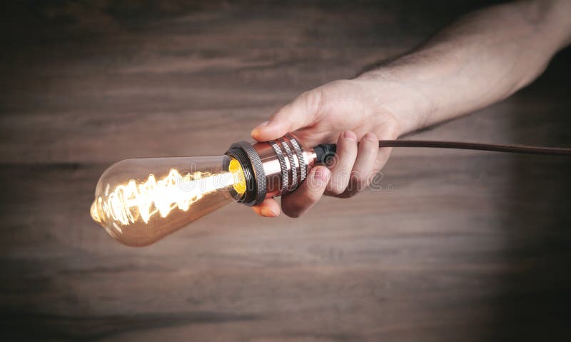Male Hand Holding Vintage Modern Light Bulb Stock Image - Image of ...