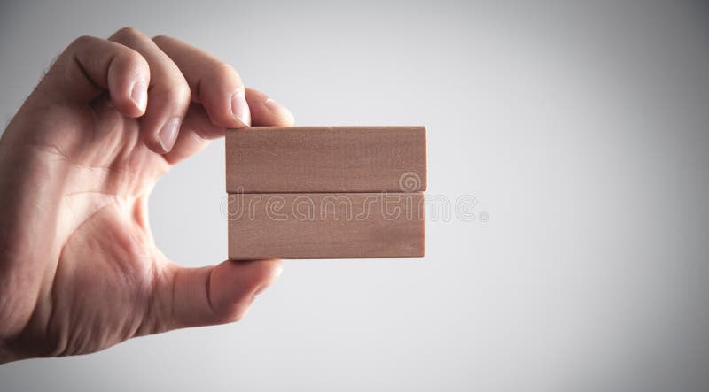 Male Hand Holding Wooden Empty Blocks Stock Image - Image of holding ...