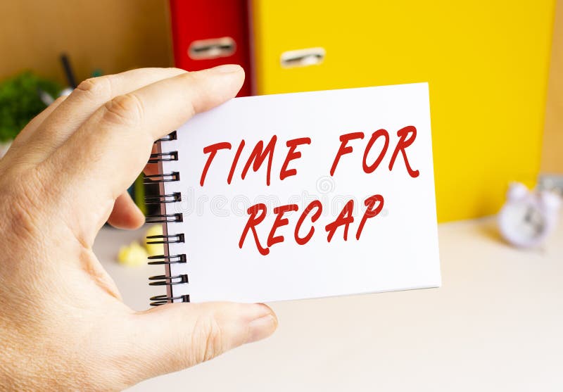 A Male Hand Holds a Notepad on a Spring with the Written TIME for RECAP ...