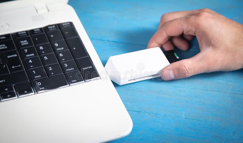 Male Hand Inserting USB Flash Drive into Laptop Computer Stock Image ...
