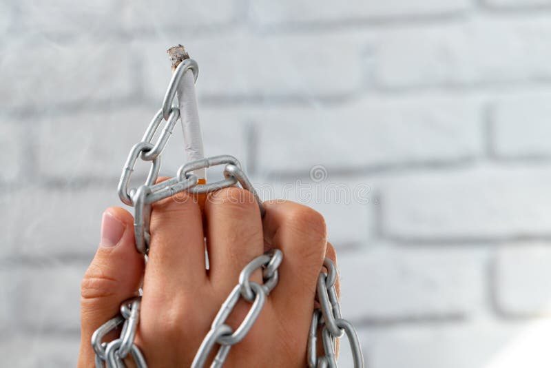 Male Hand in Metal Chains Holding Cigarette Stock Image - Image of ...