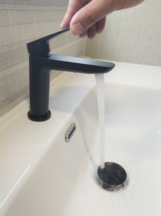 Male Hand Opening the Sink Tap Stock Photo - Image of hand, plumbing ...