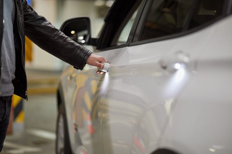 Male Hand Opens Door of White Car at Underground Stock Photo - Image of ...