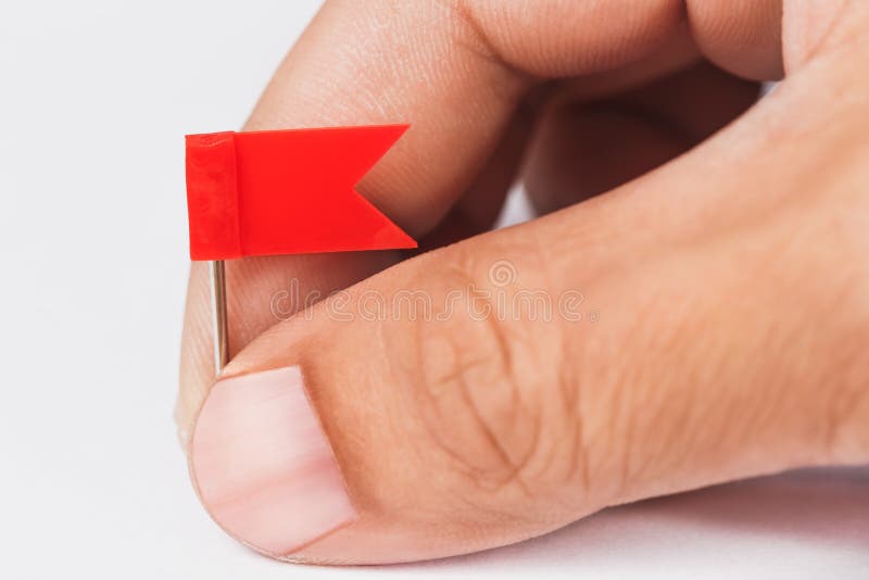 Male Hand with Plastic Red Flags Pin Stock Image - Image of hand ...