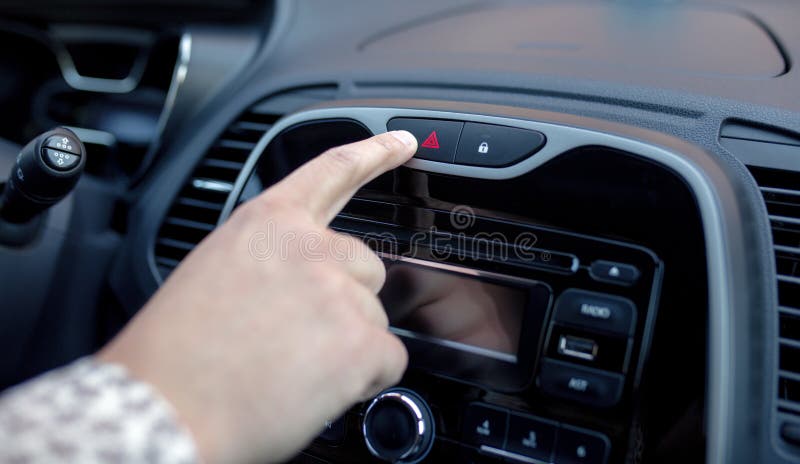 Male Hand Pressing Emergency Warning Button on Car Console Stock Image ...