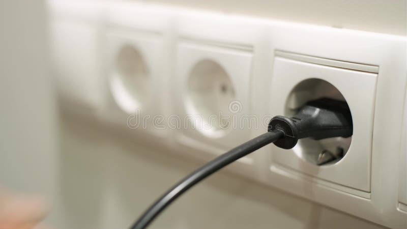 Male Hand Pulling Electrical Plugs from Sockets Stock Footage - Video ...