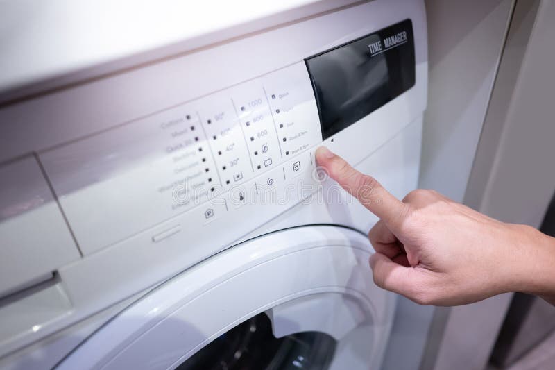 Male Hand Pushing Button on Washing Machine Stock Image - Image of ...