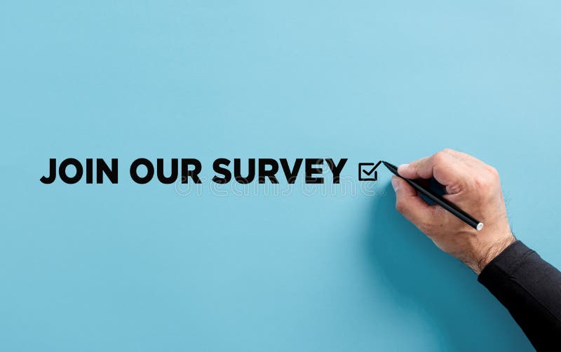 Male Hand Puts Checkmark Next To the Message Join Our Survey. Customer ...