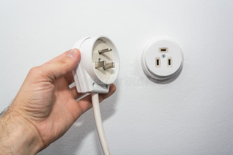 Male Hand Puts Plug in the Socket Stock Photo - Image of amps, paste ...
