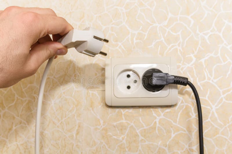 Male Hand Puts Plug in the Socket Stock Image - Image of concept ...