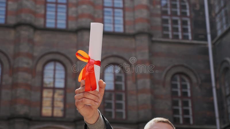 Raising Diploma As a Sign of Achievement Stock Video - Video of ...