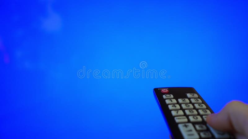 Male Hand with Remote Control Pointing on TV Screen. Stock Video ...
