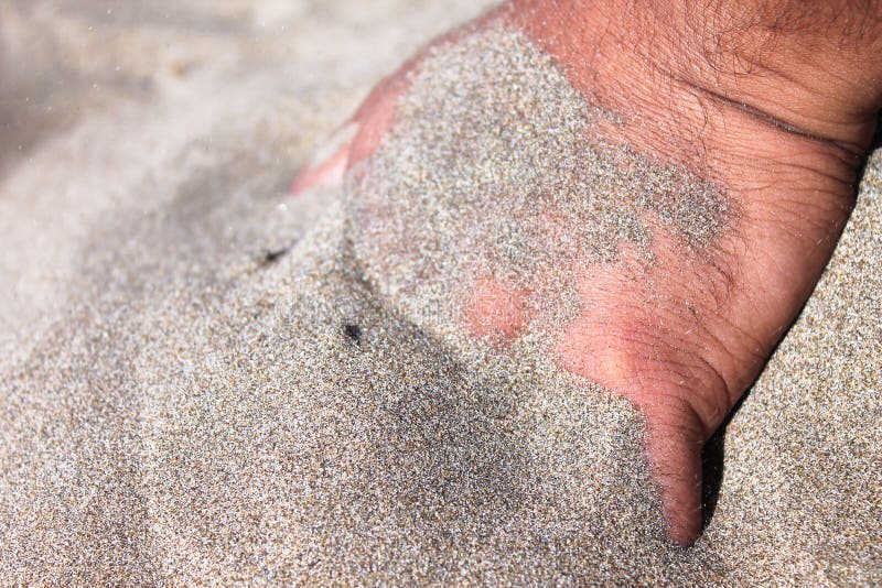 Male Hand stock photo. Image of sandy, beautiful, tranquil - 87300338