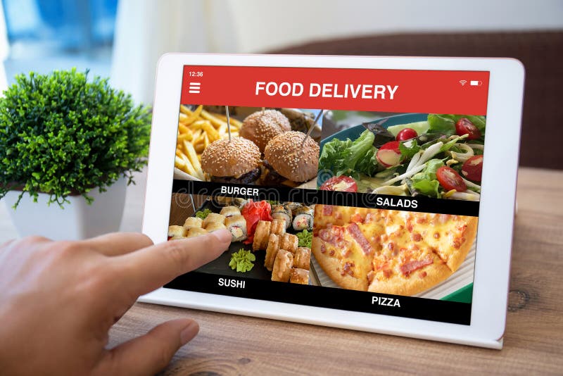 Male Hand Selects Menu Computer Tablet with Food Delivery Application ...