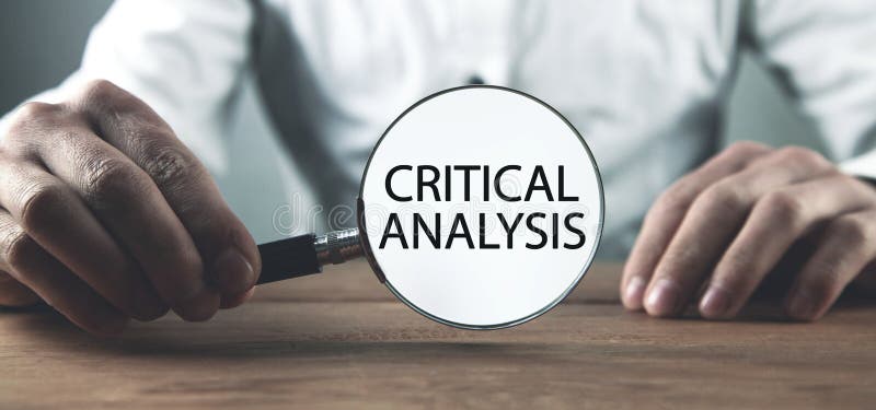 Male Hand Showing Magnifying Glass with a Critical Analysis Text Stock ...