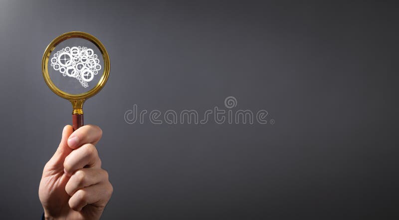Male Hand Showing Magnifying Glass with a Human Brain Stock Photo ...