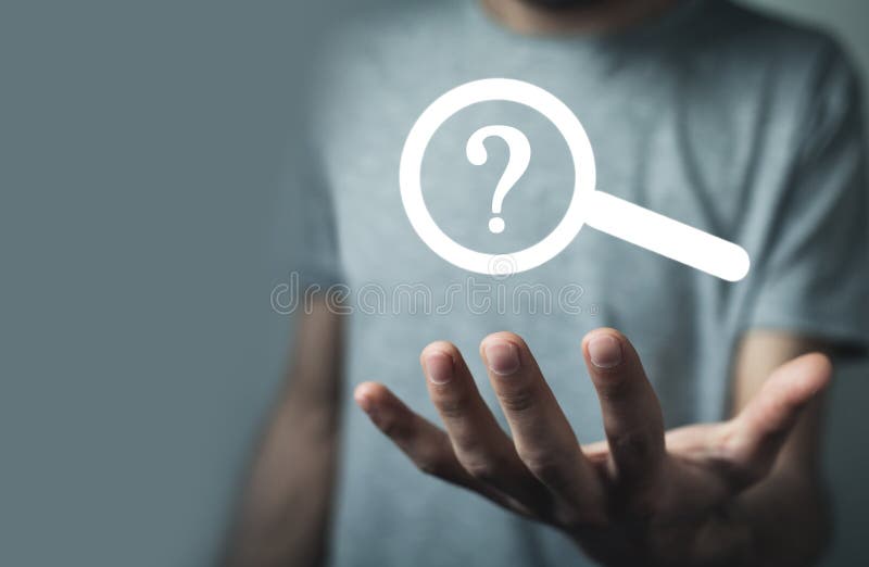 Male Hand Showing Magnifying Glass with a Question Mark Stock Photo ...