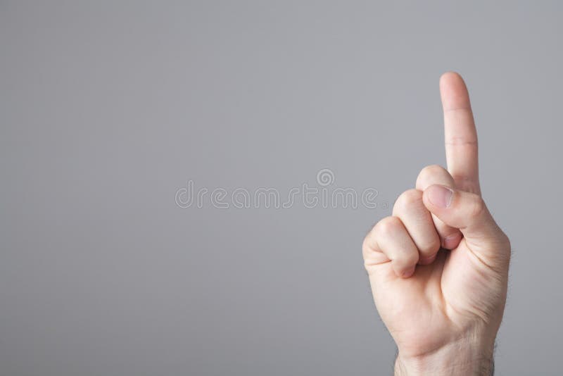 Male Hand Showing One Finger Stock Photo - Image of gesture, index ...