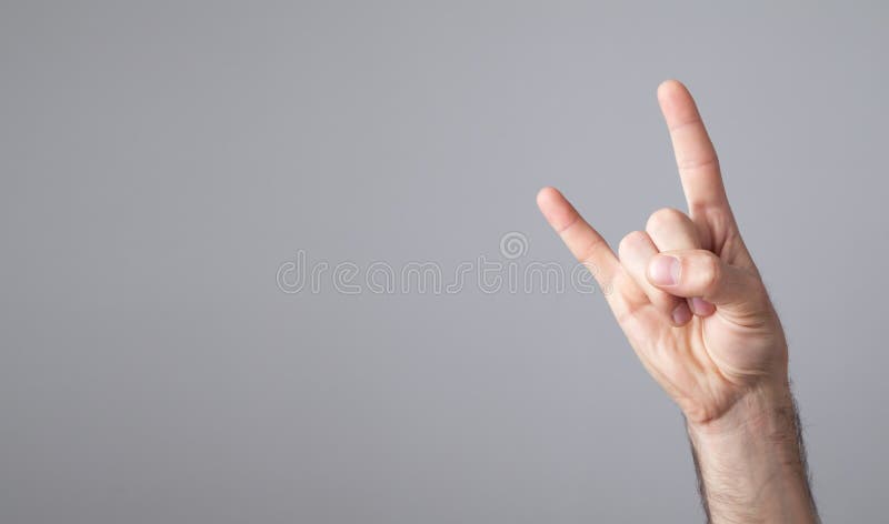 Male Hand Showing Rock Gesture. Space for Your Text Stock Photo - Image ...