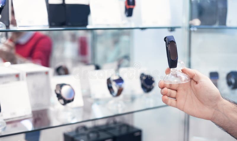 Male Hand Showing Smart Watch in Store. Personal Device Stock Photo ...