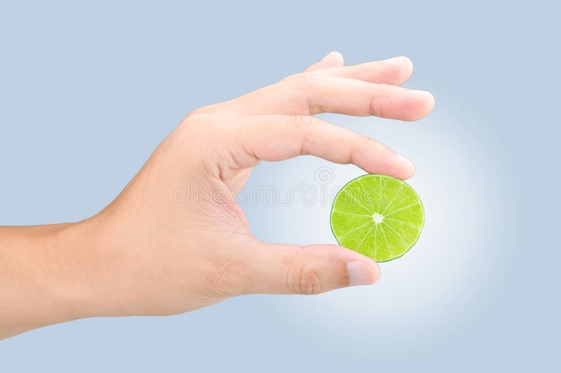 Male Hand Squeezing Lime with Clipping Path Stock Photo - Image of ...