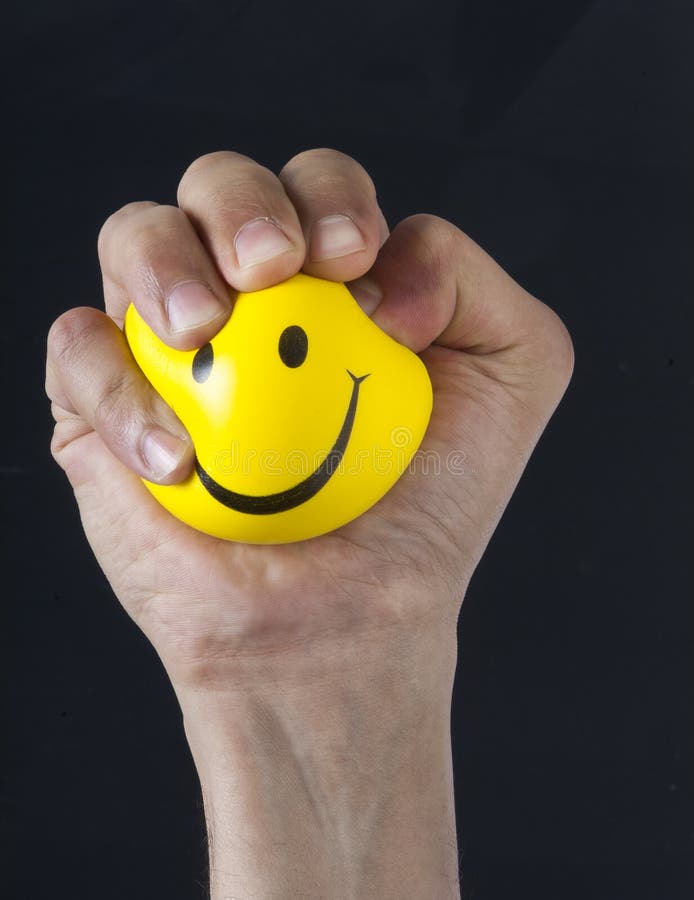 Hand Squeezing Stress Ball stock photo. Image of frustration - 110903568