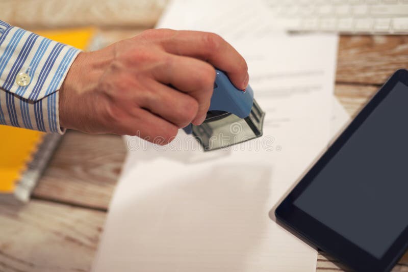 Male Hand Stamping Document Stock Image - Image of paper, lawyer: 80599063