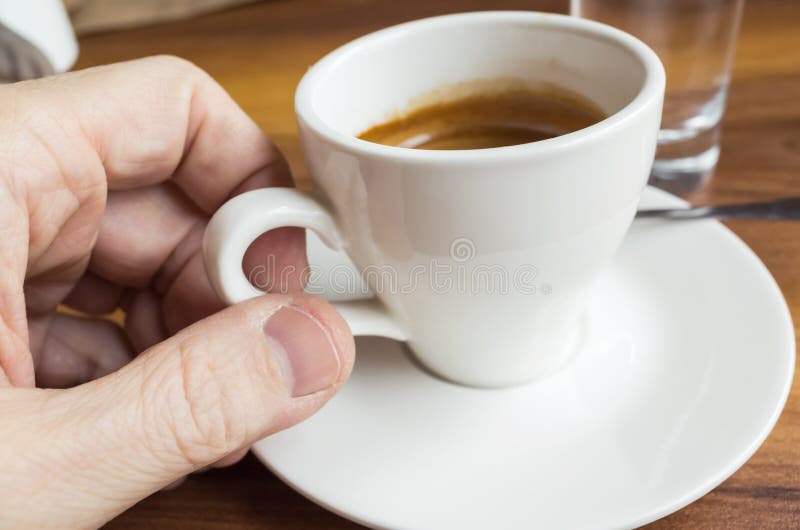 Male Hand Taking a Cup of Espresso Coffee Stock Photo - Image of caffe ...