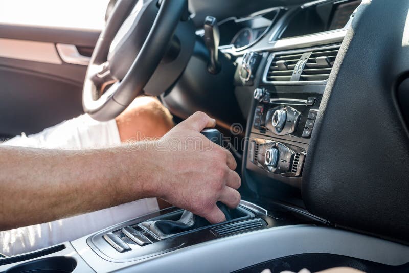 Male Hand on Transmission Gear Inside Car. Close View of Male Hand with ...