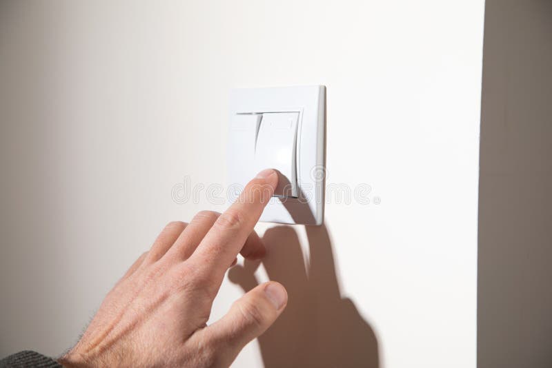 Male Hand Turning Off or on Light Switch Stock Image - Image of hand ...
