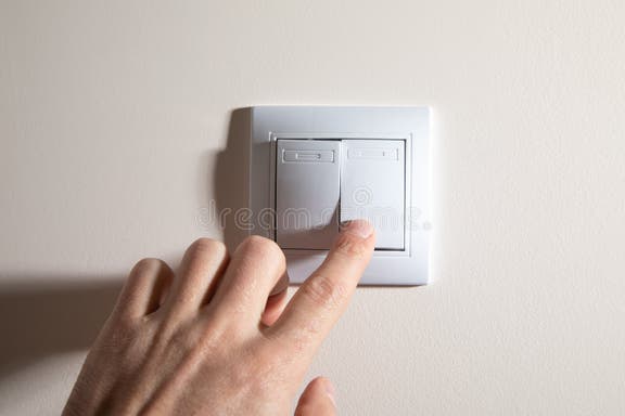Male Hand Turning Off or on Light Switch Stock Photo - Image of ...