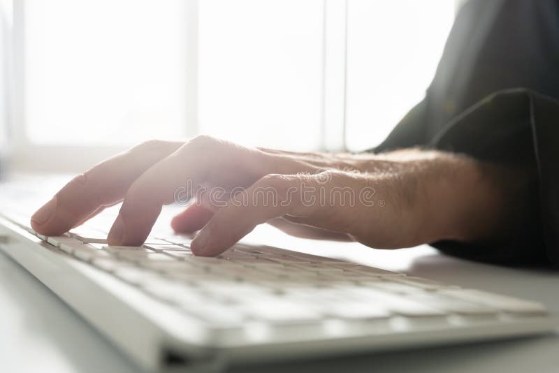 Male Hand Typing on White Computer Keyboard Stock Photo - Image of ...