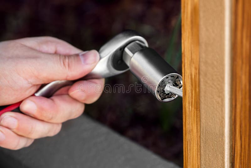 Male Hand is Using a Universal Adjustable Socket Wrench Stock Photo ...