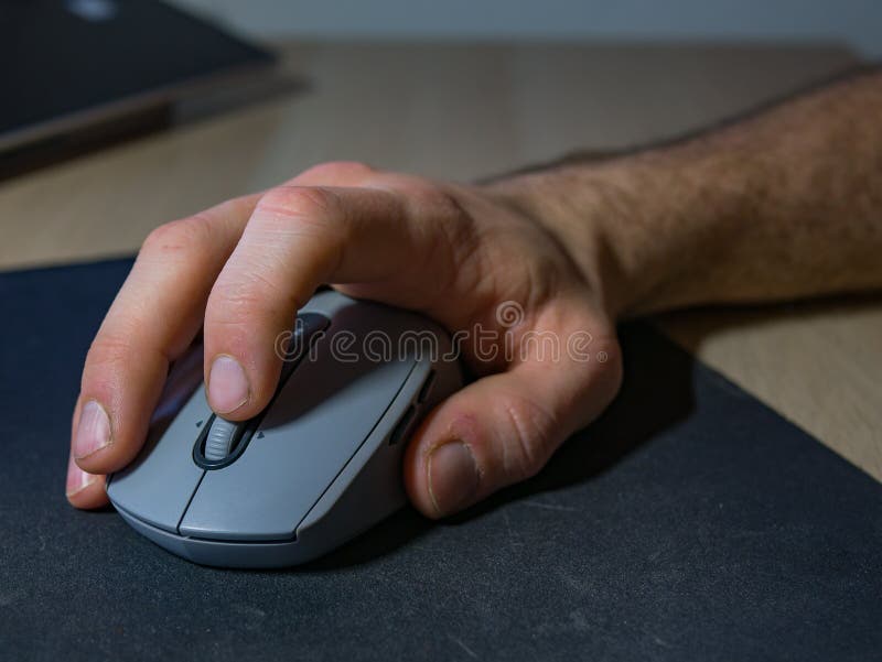 Male Hand Works with Wireless Mouse on Table Stock Image - Image of ...