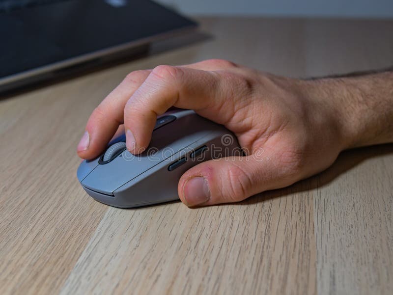 Male Hand Works with Wireless Mouse on Table Stock Photo - Image of ...