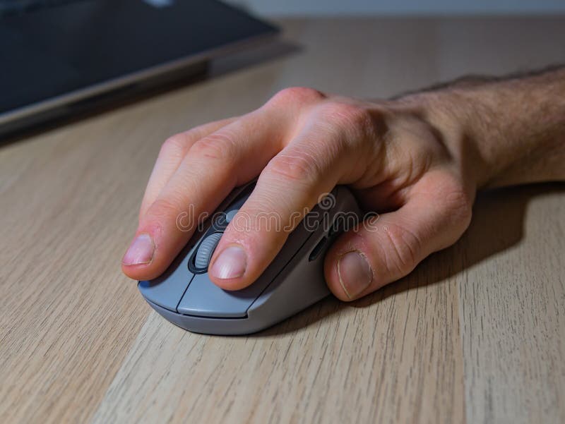 Male Hand Works with Wireless Mouse on Table Stock Photo - Image of ...