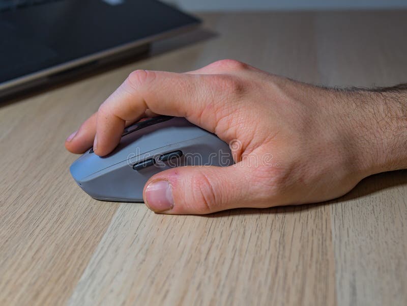 Male Hand Works with Wireless Mouse on Table Stock Photo - Image of ...