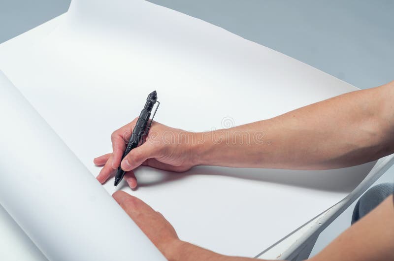 Male Hand Writes a Black Pen on White Paper Stock Image - Image of draw ...