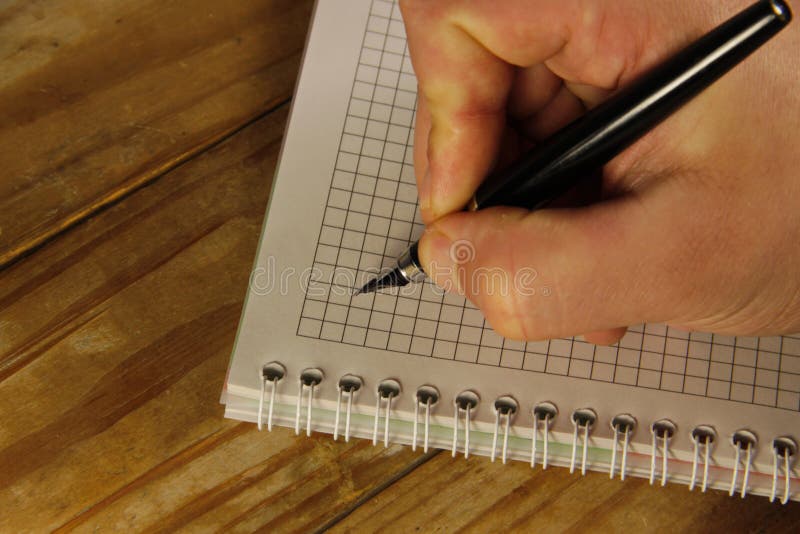 Male Hand Writing Using Fountain Pen on a Notebook Stock Image - Image ...