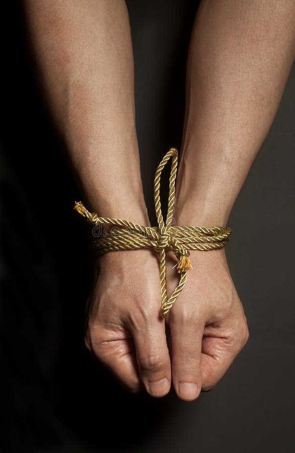 Male hands bound with rope stock image. Image of arms - 97040507