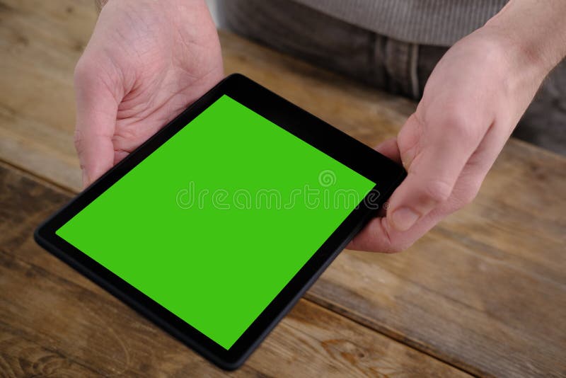 Male Hands Holding Modern Black E-book Reader, Digital Book with Green ...