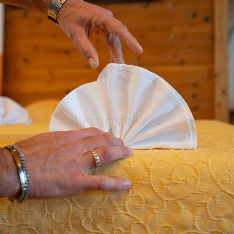 Male Hands Holding Napkin for Table Setting on the Table Stock Photo ...