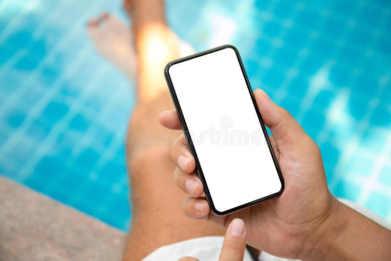 Male Hands Holding Phone with Isolated Screen in the Pool Stock Image ...