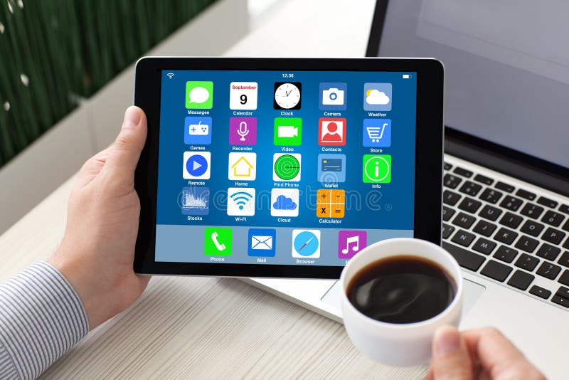 Male Hands Holding Tablet Computer with Home Screen Icons Apps Stock ...