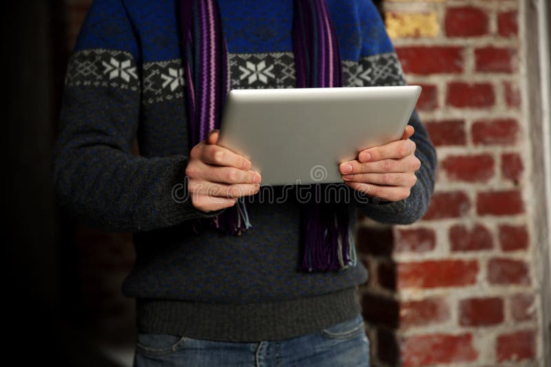 Male Hands Holding Tablet Computer Near Brick Wall Stock Image - Image ...