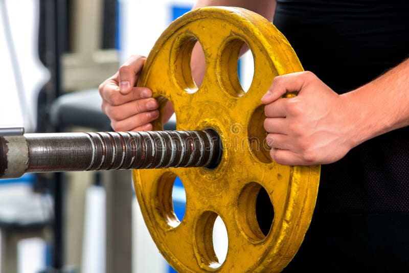 Male Hands Lifting Heavy Barbell at Gym Stock Photo - Image of exercise ...